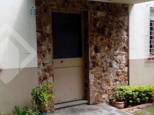 Apartamento com dois quartos e garagem