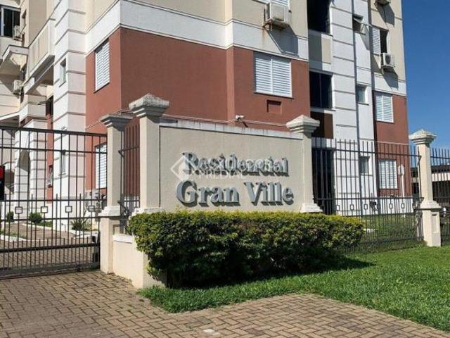 Apartamento com dois quartos e sacada no bairro Santa Fé em Gravataí