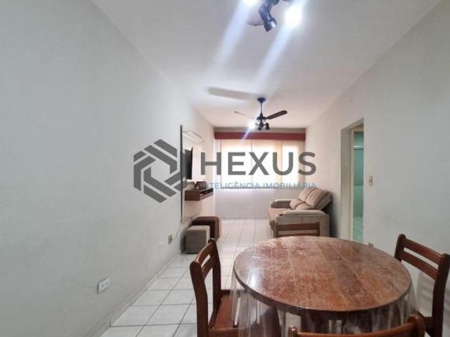 Apartamento com despesas baixas a duas quadras da Praia das Pitangueiras, Guaruj