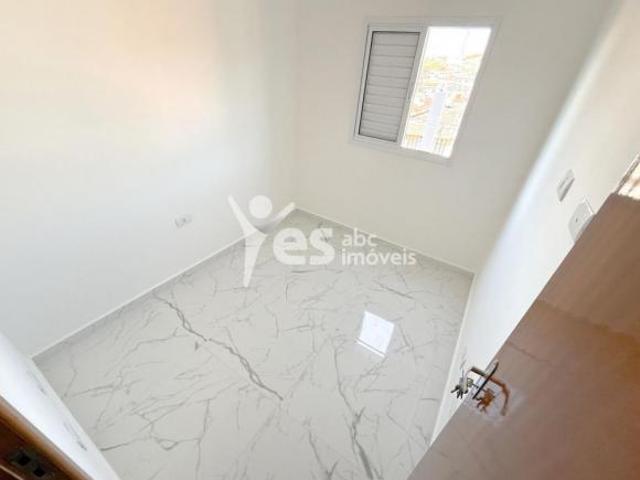 Apartamento com elevador e suíte na Vila Linda REF: 18731