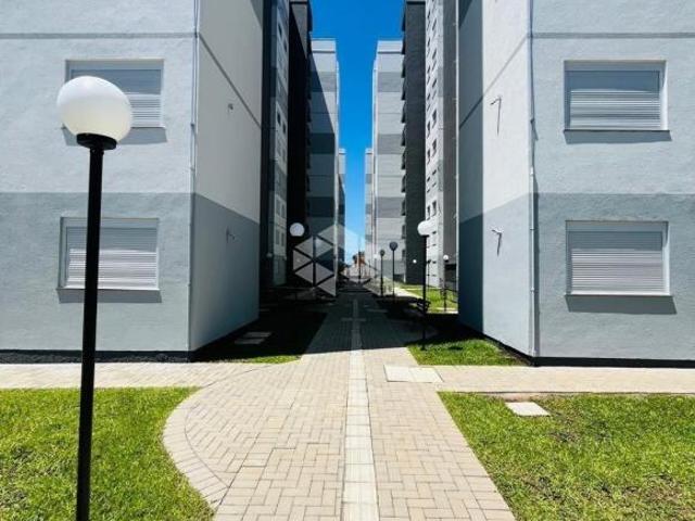 Apartamento com sacada e churrasqueira