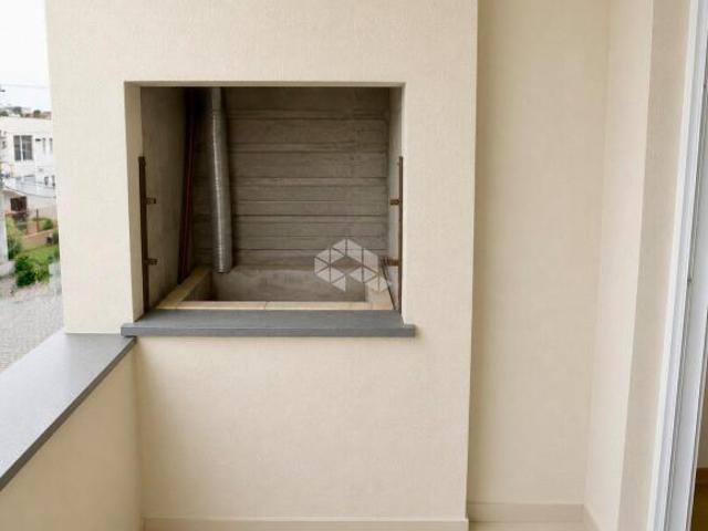 Apartamento com sacada e churrasqueira no bairro Santa Lúcia