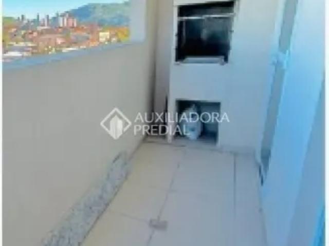 Apartamento com sacada e churrasqueira serraria