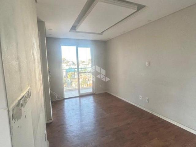 Apartamento com sacada e Vaga de Garagem Condomínio Village