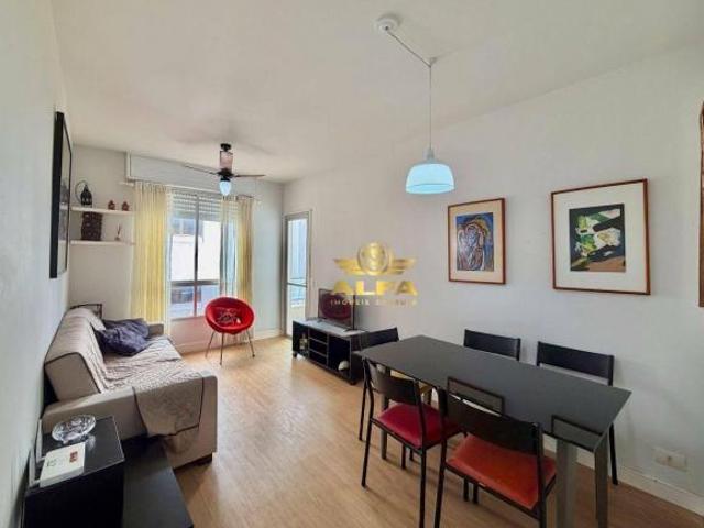 Apartamento com sacada em condomínio frente mar na Praia das Astúrias – Alfa Imóveis Guarujá
