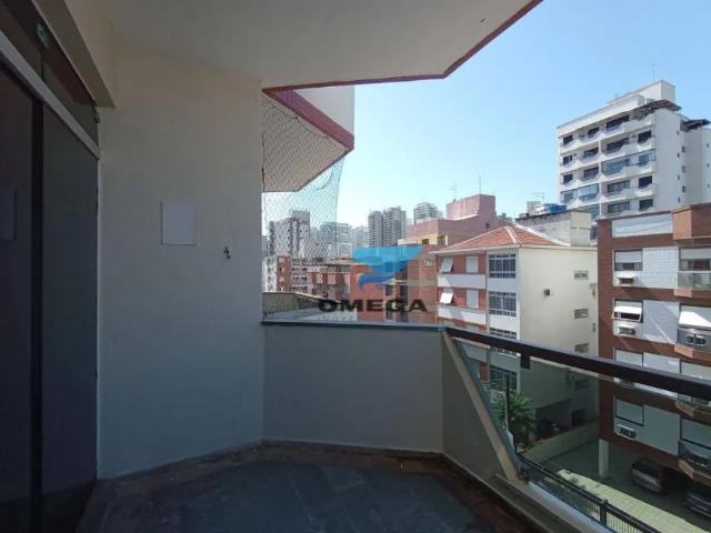 Apartamento com sacada 3 quartos 1 vaga de garagem à venda na praia das Astúrias Guarujá/SP