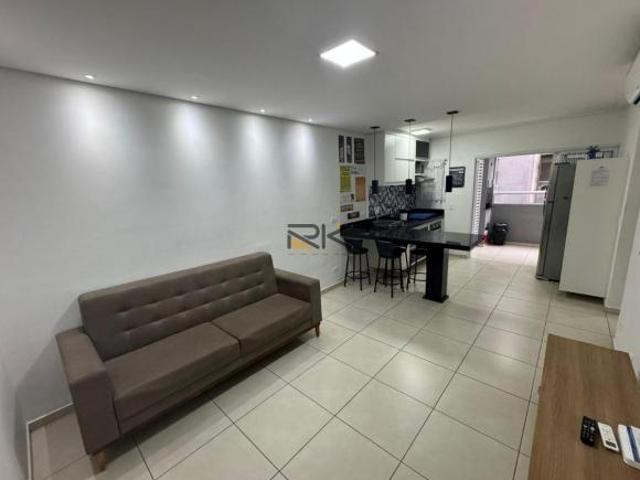 Apartamento com sala de estar e jantar,varanda gourmet com churrasqueira