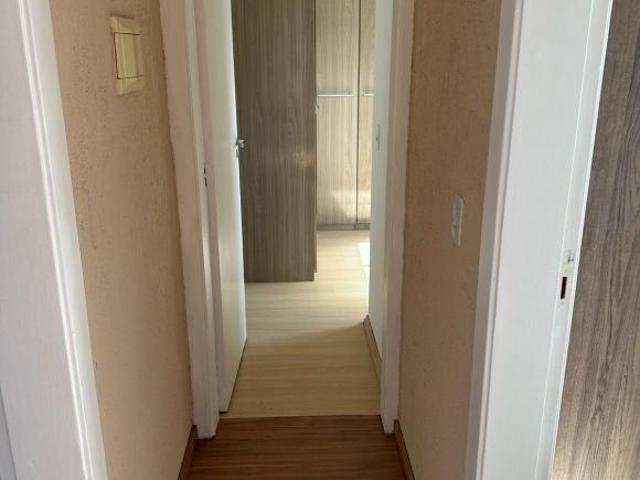 Apartamento com suíte semi mobiliado
