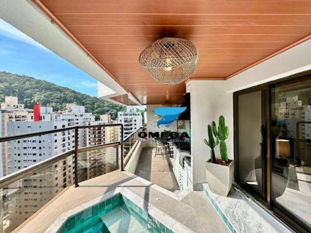 Apartamento com piscina na varanda à venda na Praia das Pitangueiras no Guarujá | Omega Imóveis