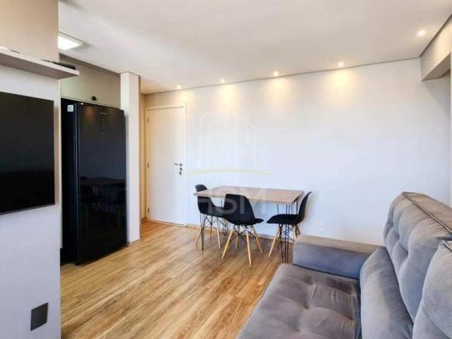Apartamento com planejados, varanda envidraçada e lazer completo no Baeta Neves