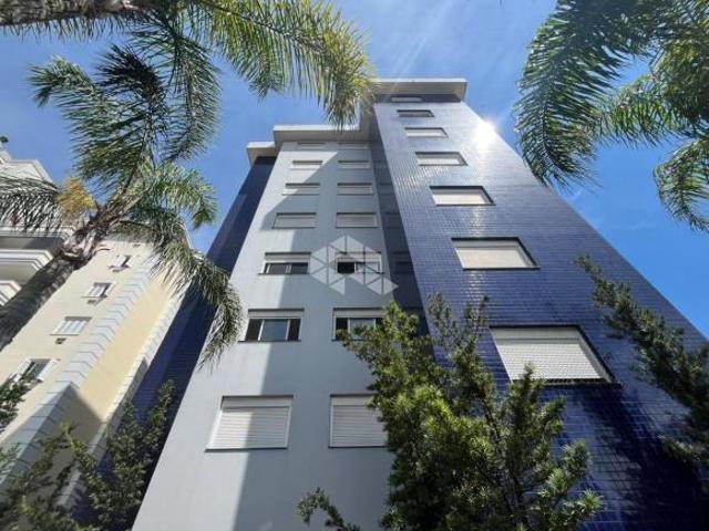 Apartamento com três dormitórios com suíte no cento