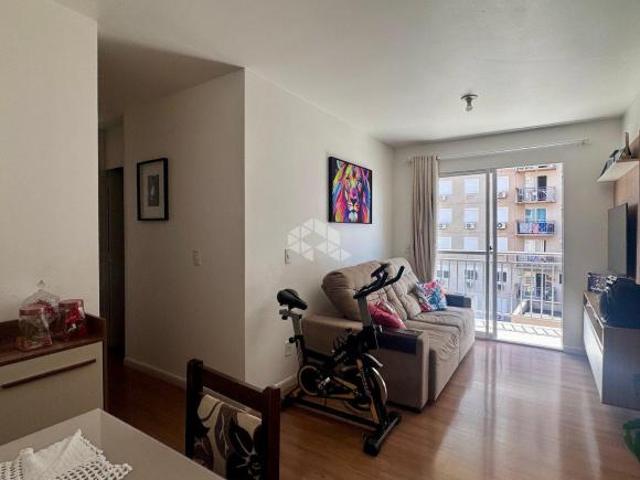 Apartamento com três quartos e vaga escriturada