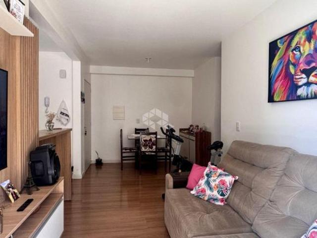 Apartamento com três quartos e vaga escriturada