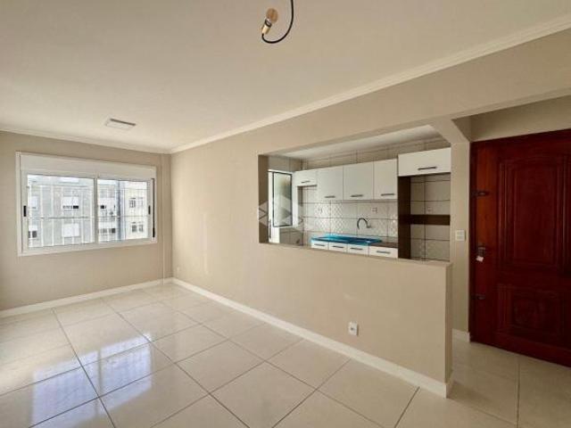 Apartamento com três quartos e vaga, no bairro Tristeza