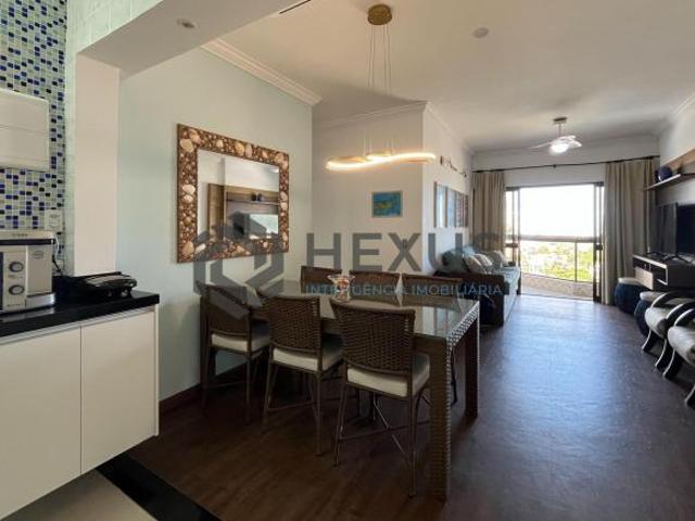 Apartamento com varanda vista mar e lazer na beira mar da Praia da Enseada, Guar