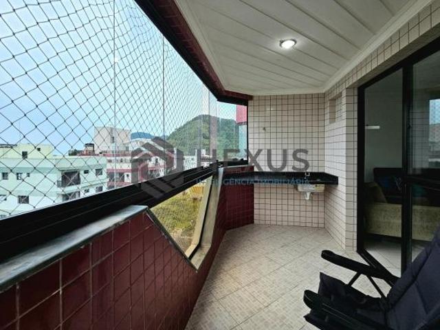 Apartamento com varanda e lazer na beira mar da Praia do Tombo, Guaruja