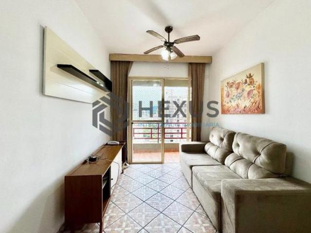 Apartamento com varanda e lazer na Praia da Enseada, Guaruja