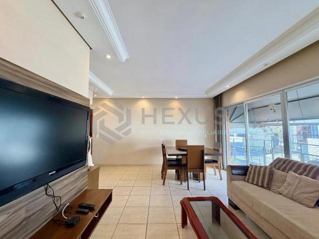 Apartamento com varanda e lazer na Praia da Enseada, Guarujá