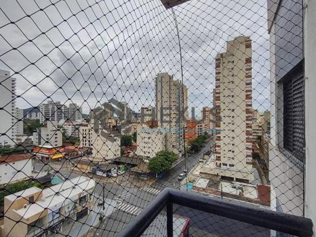 Apartamento com varanda e lazer na Praia da Enseada, Guaruja