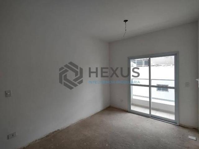 Apartamento com varanda e lazer na Praia da Enseada, Guaruja