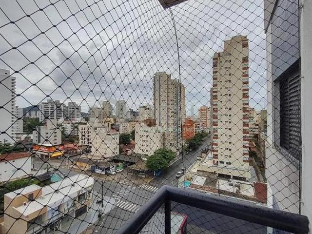 Apartamento com varanda e lazer na Praia da Enseada, Guaruja