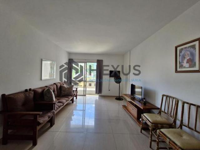 Apartamento com varanda e lazer na Praia das Pitangueiras, Guaruja