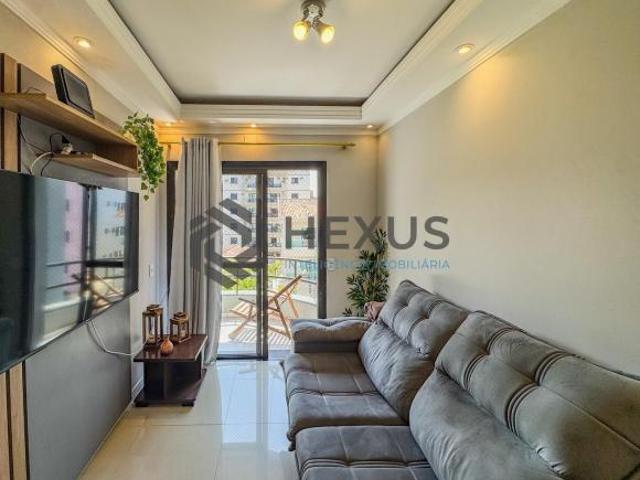 Apartamento com varanda e lazer na Praia do Tombo, Guaruja