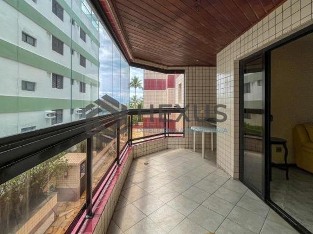 Apartamento com varanda e lazer na Praia do Tombo, Guarujá