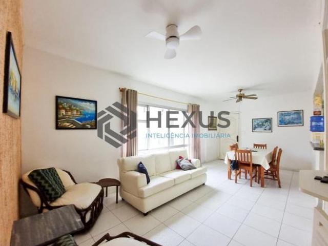 Apartamento com varanda e lazer a duas quadras da Praia das Pitangueiras, Guaruj