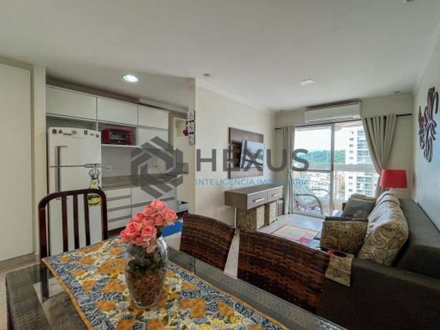 Apartamento com varanda e lazer de clube na Praia das Astúrias, Guarujá