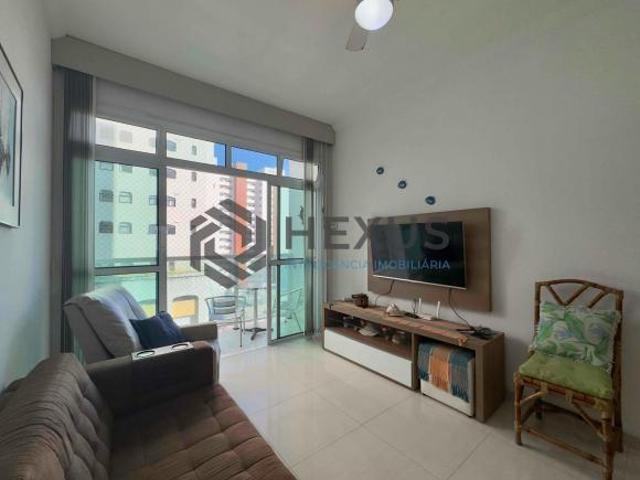 Apartamento com varanda e vista mar a uma quadra da Praia das Pitangueiras de 2