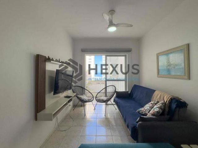 Apartamento com varanda e vista mar a uma quadra da Praia das Pitangueiras de 2