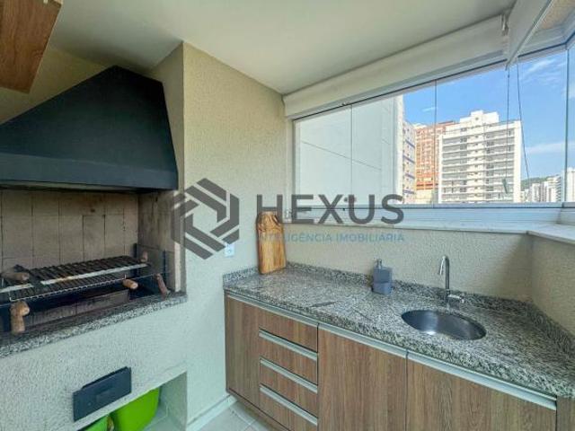 Apartamento com varanda gourmet a lazer na Praia das Pitangueiras, Guaruja