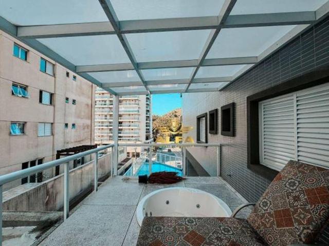 Apartamento com varanda gourmet e jacuzzi a poucos passos do mar nas Astúrias – Alfa Imóveis Guarujá