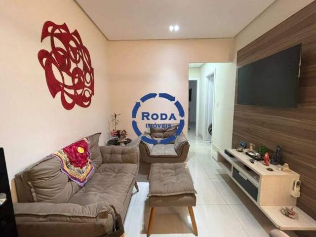 Apartamento com varanda gourmet e suíte a duas quadras da praia