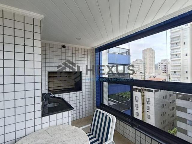 Apartamento com varanda gourmet e vista mar na Praia da Enseada, Guaruja