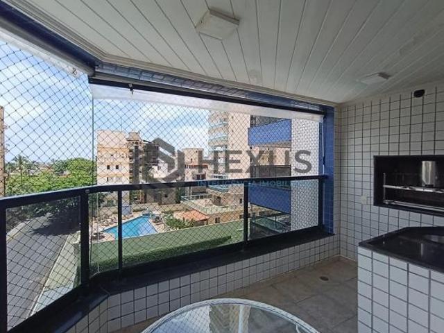 Apartamento com varanda gourmet e vista mar na Praia da Enseada, Guaruja