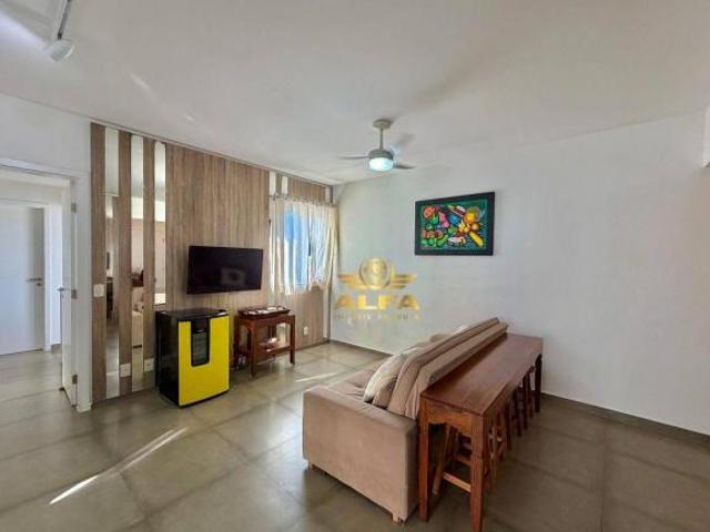 Apartamento com varanda gourmet e vista mar na Praia das Pitangueiras – Alfa Imóveis Guarujá