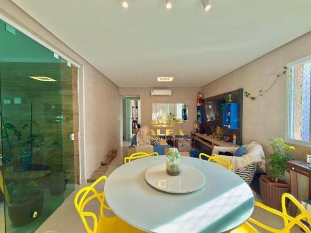 Apartamento com varanda gourmet e vista mar na Praia das Pitangueiras – Alfa Imóveis Guarujá