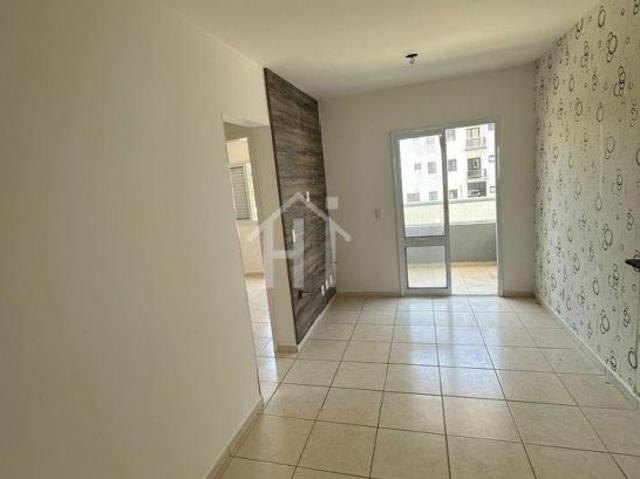 APARTAMENTO COM VARANDA GOURMET PRÓXIMO À PRAIA