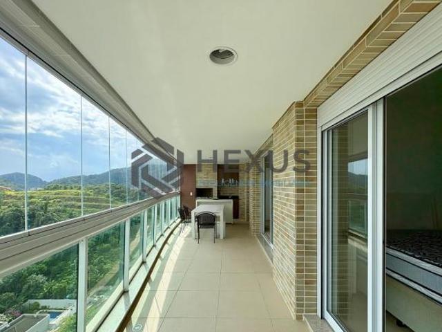 Apartamento com varanda gourmet vista mar e lazer na Praia da Enseada, Guaruja