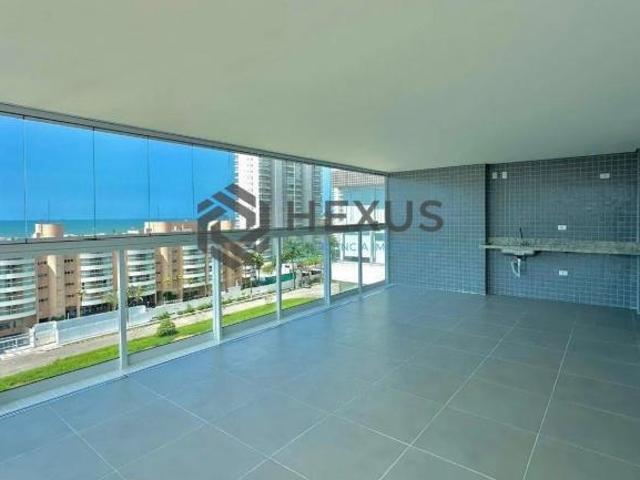 Apartamento com varanda gourmet vista mar e lazer a 100m da praia na Enseada, Gu