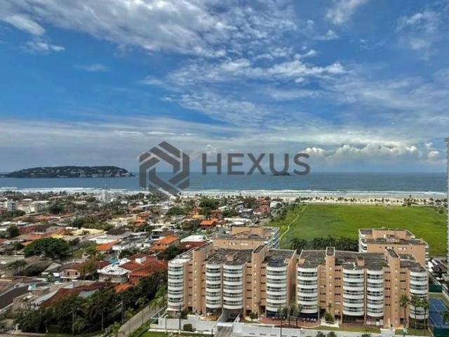 Apartamento com varanda gourmet vista mar e lazer a 100m da praia na Enseada, Gu