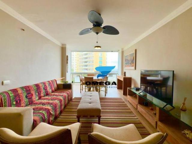 Apartamento com vista mar à venda na praia das Pitangueiras no Guarujá I Omega Imoveis