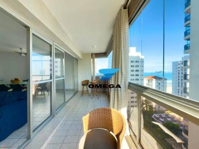 Apartamento com vista mar à venda na praia das Pitangueiras no Guarujá I Omega Imoveis