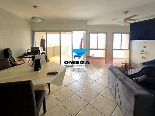 Apartamento com vista mar à venda na praia das Pitangueiras no Guarujá I Omega Imoveis