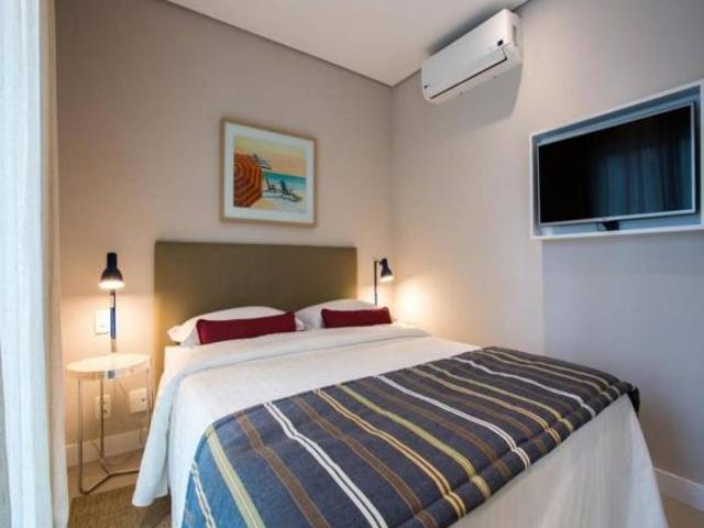 Apartamento com vista mar, 1 dormitório, suíte e 1 vaga. Santos Gonzaga