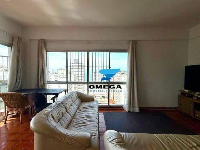 Apartamento com vista parcial para o mar à venda na praia das Pitangueiras no Guarujá I Omega Imovei