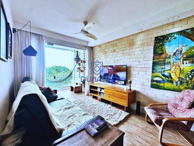 Apartamento conservado à venda em Prédio com lazer nas Astúrias no Guarujá SP