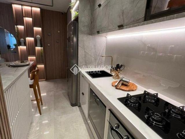 apartamento de 50 m² 2 dormitórios, sendo 2 suítes